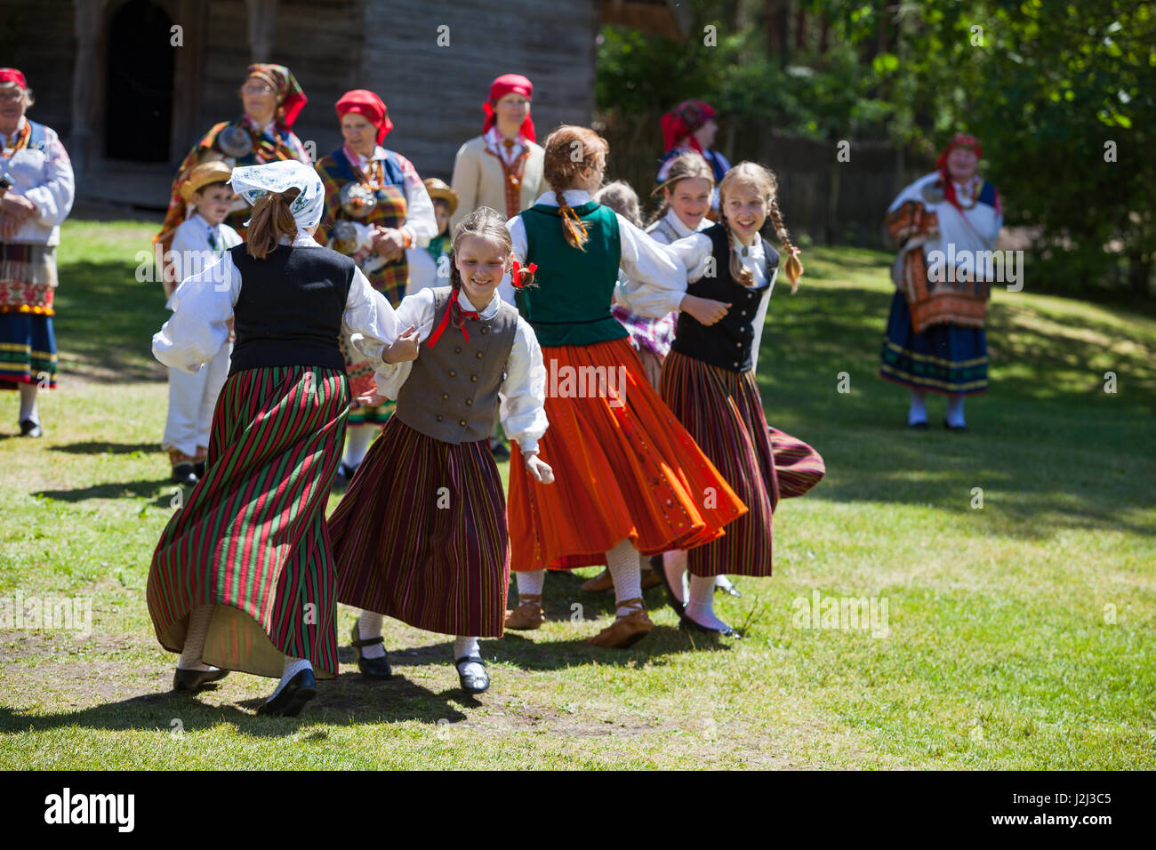 RIGA, LATVIA - 12 JUN 2016: Latvian dancers in national costumes ...