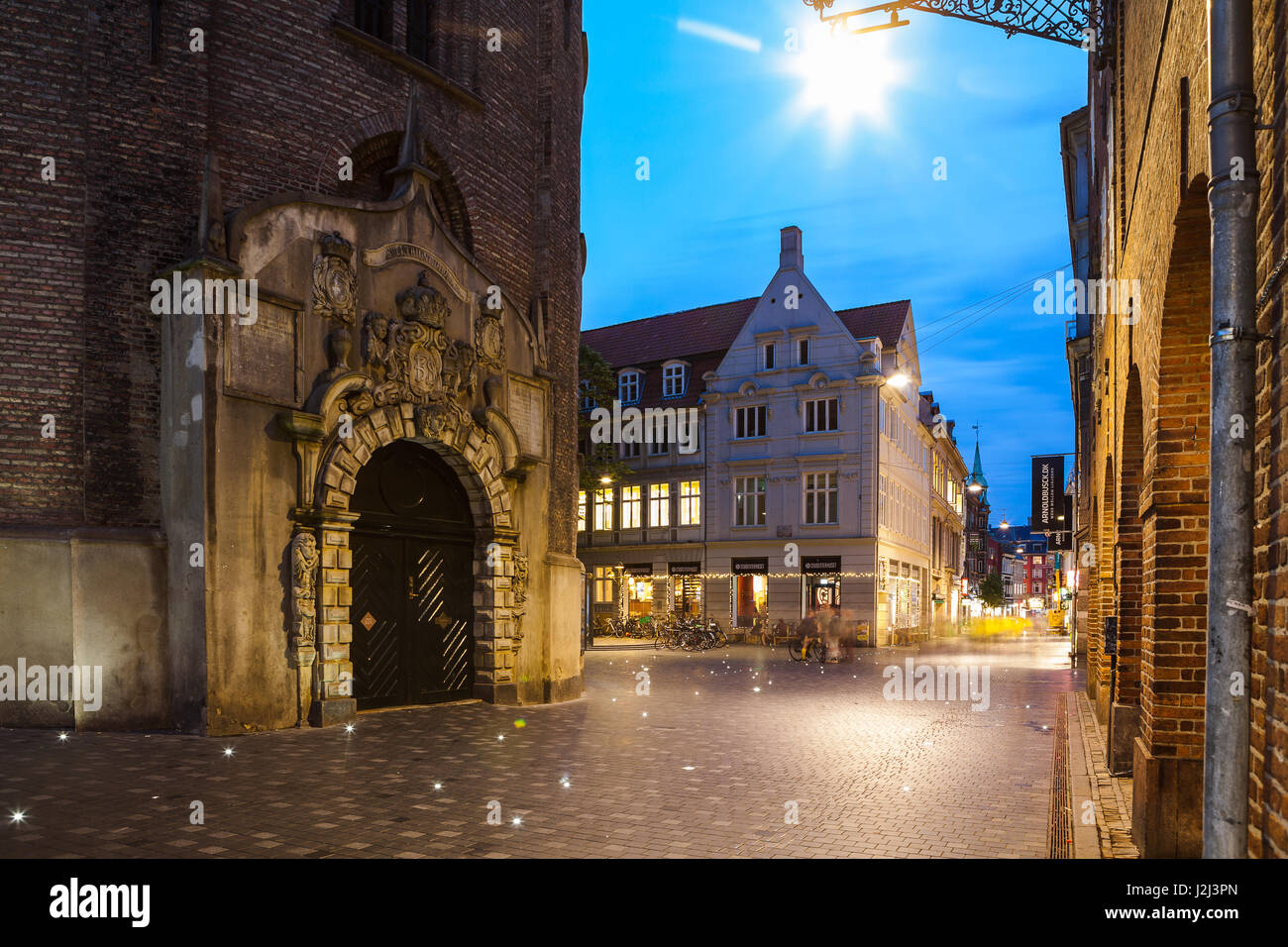 COPENHAGEN, DENMARK - 24 JUN 2016: Night illuminated street in city ...