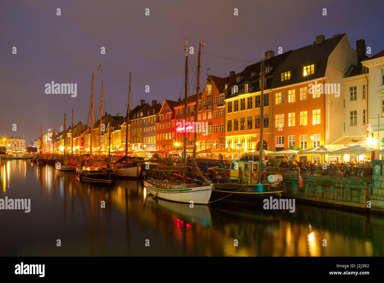 Night view of beautiful Nyhavn Canal. Copenhagen, Denmark Stock Photo ...