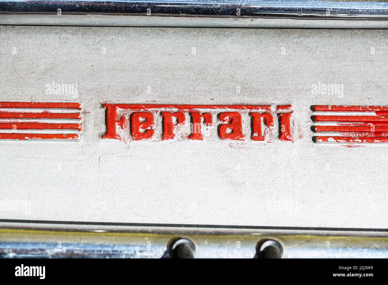 MODENA, ITALY - JULY 09: Logo Ferrari on motor of sport carat ...