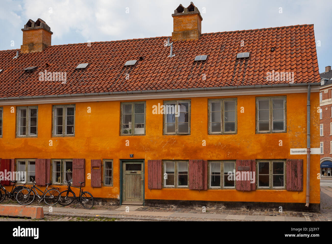 Facade of one of the houses of Nyboder district, Copenhagen, Denmark ...