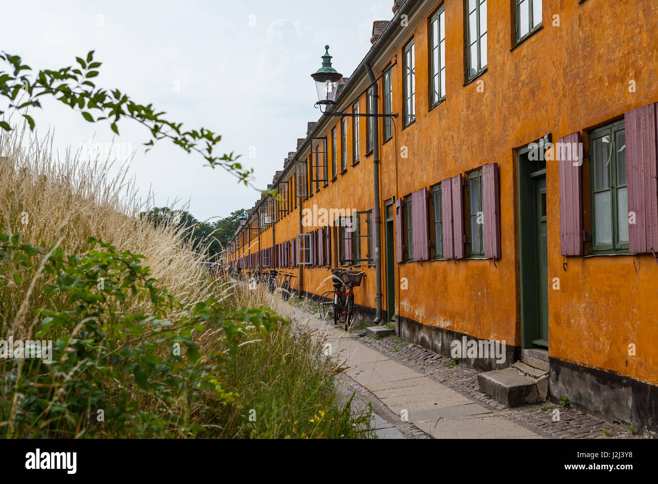 Facade of one of the houses of Nyboder district, Copenhagen, Denmark ...