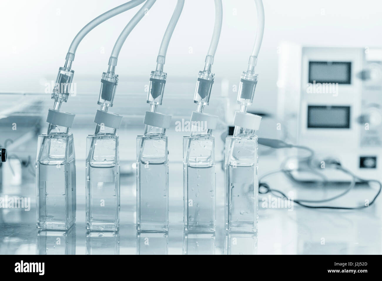 Laboratory bottles and tubes, close up Stock Photo - Alamy