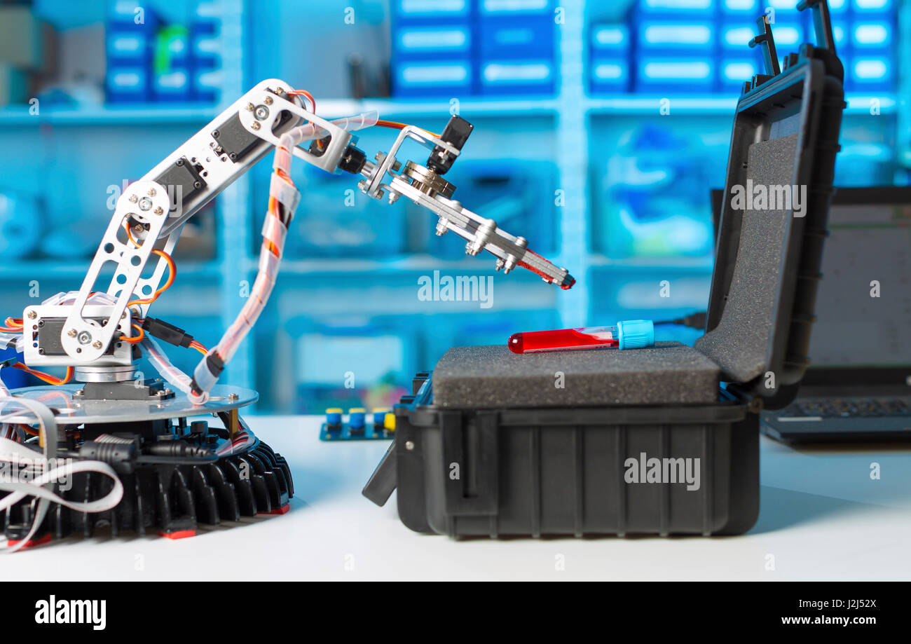 Robotic arm and test tube in the laboratory Stock Photo - Alamy