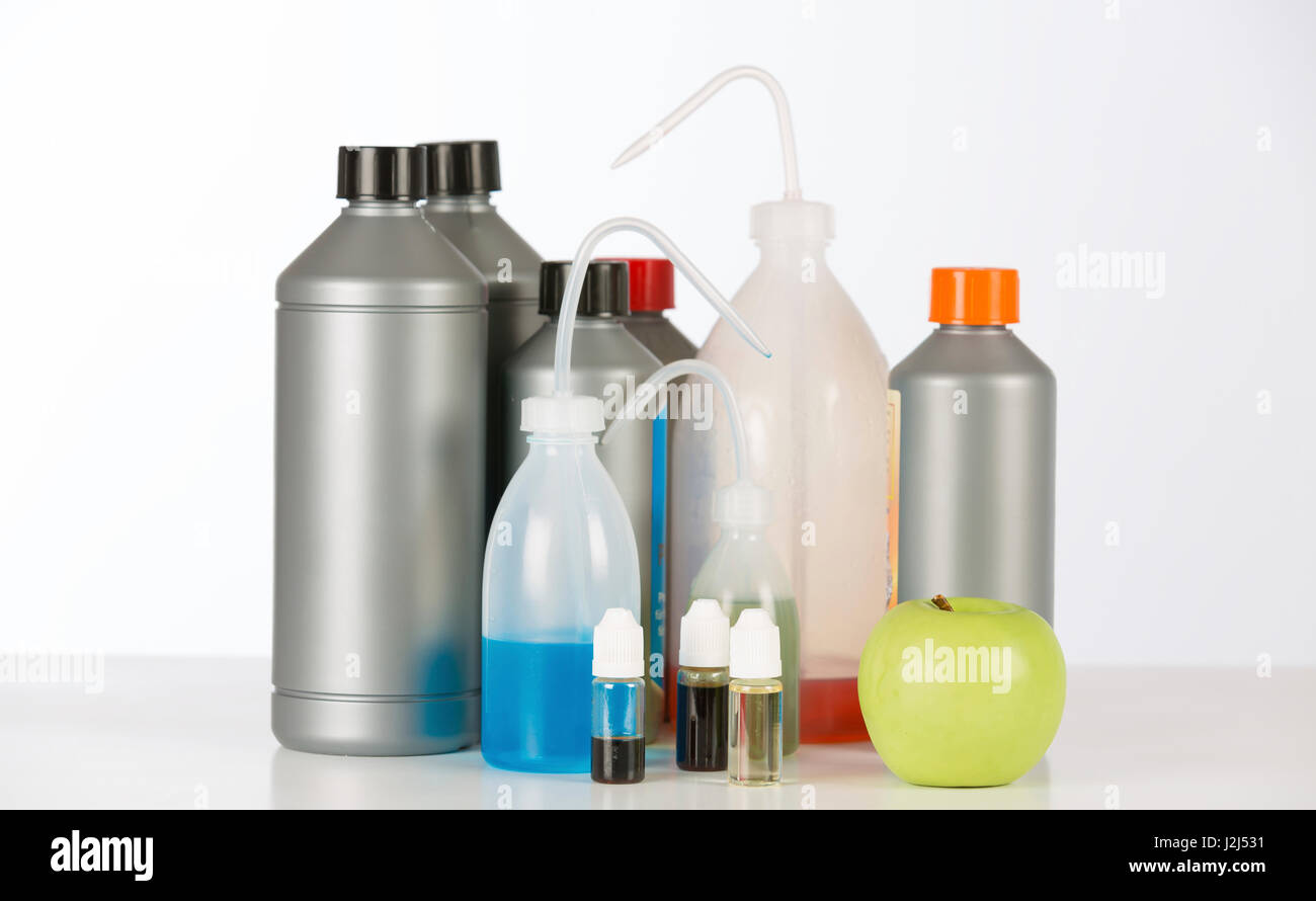Laboratory containers and bottles against a white background Stock ...