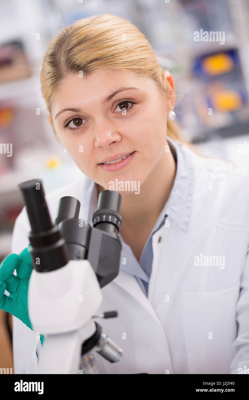Scientist looking in microscope hi-res stock photography and images - Alamy