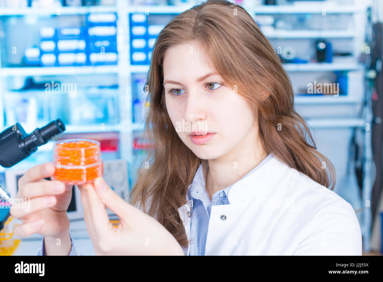 Female scientist testing foods in the laboratory Stock Photo - Alamy