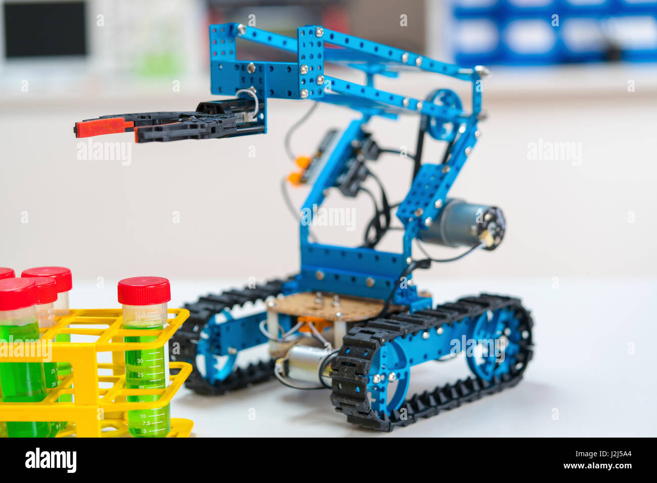 Robotic arm and test tubes Stock Photo - Alamy