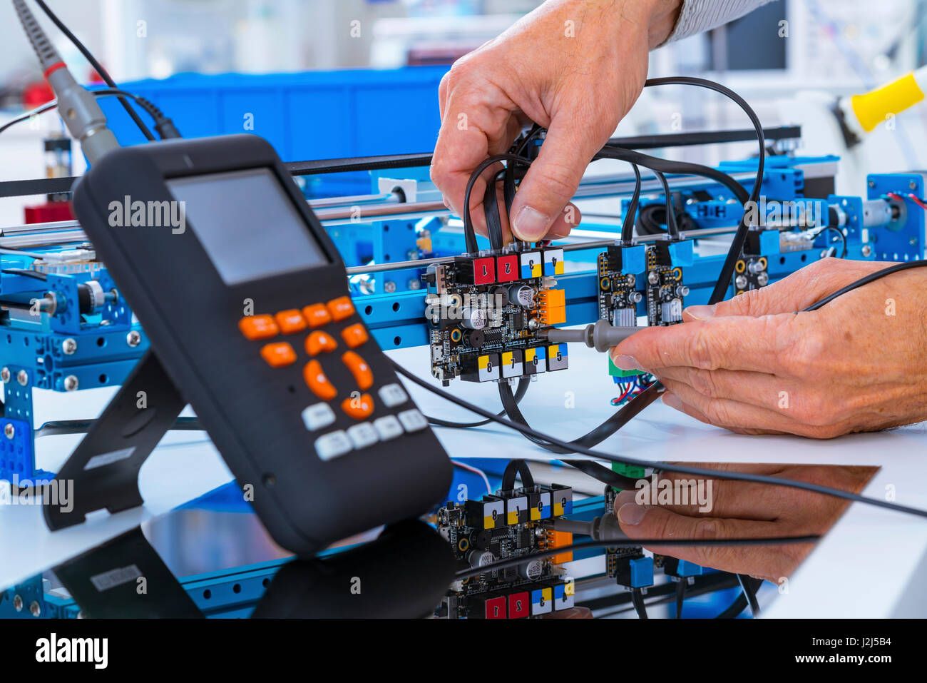 Person working in electronics laboratory Stock Photo - Alamy