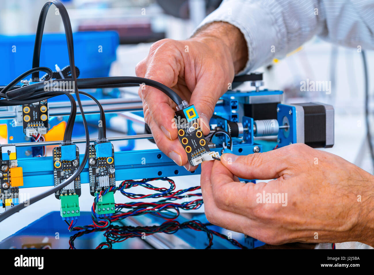 Person working in electronics laboratory Stock Photo - Alamy