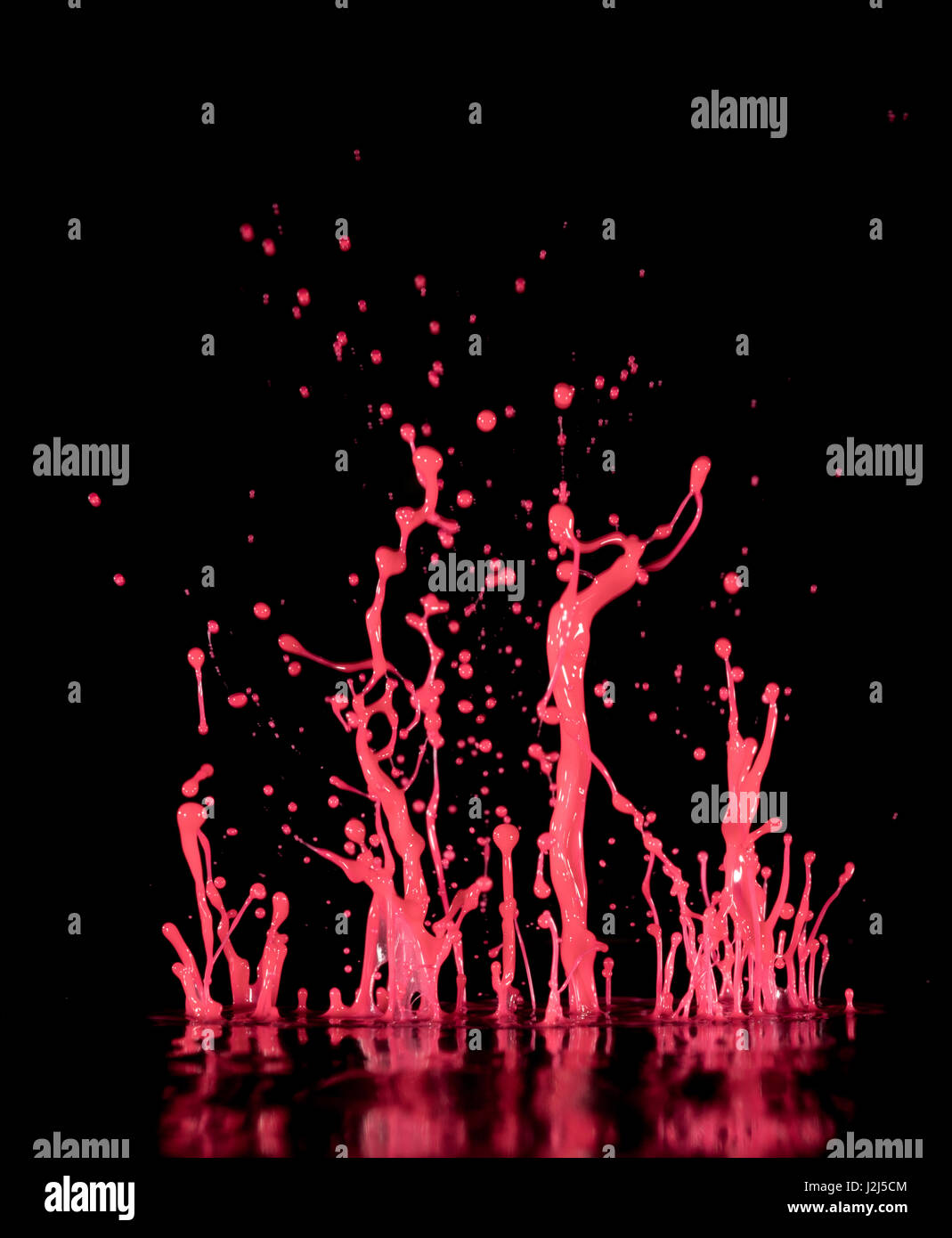 Red splashes against a black background Stock Photo - Alamy