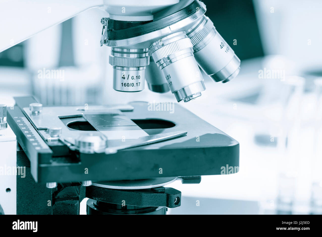 Microscope slide on microscope, close up Stock Photo - Alamy