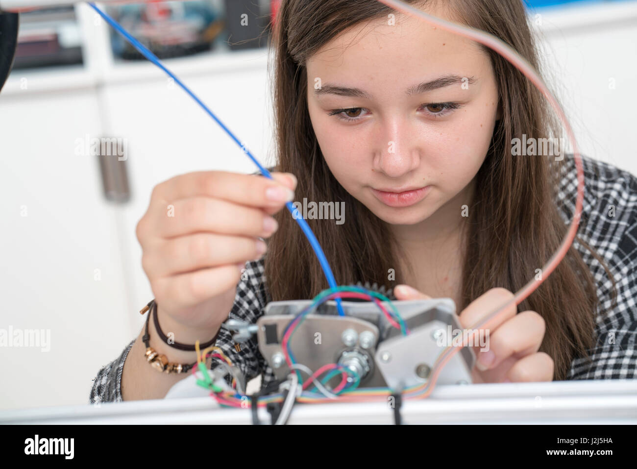 Female electronics student in laboratory Stock Photo - Alamy