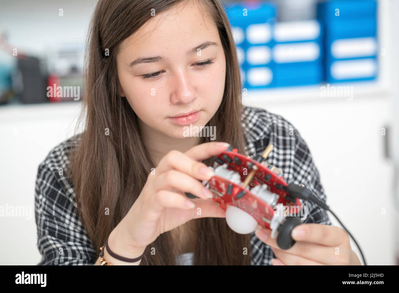Female electronics student in laboratory Stock Photo - Alamy
