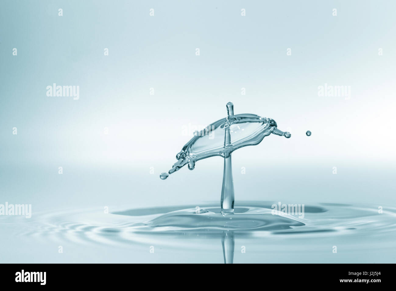 Water splashing on water surface Stock Photo - Alamy