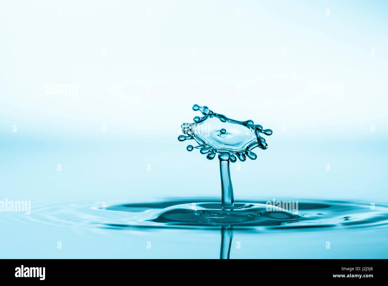 Water splashing on water surface Stock Photo - Alamy