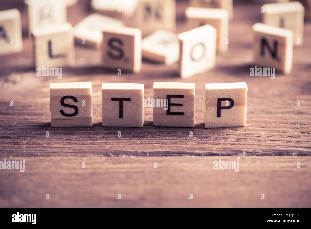 wooden elements with letter collected word step Stock Photo - Alamy