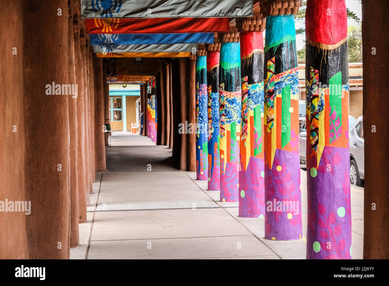 Brightly painted colorful columns in old town Santa Fe, New Mexico ...