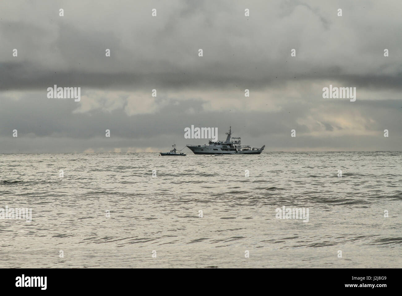 Okeanos Aggressor diving ship from the sandy beach Cocos Iceland, Costa ...