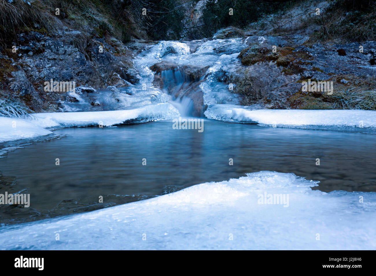 natural sculptural ice forms in the mountain brook Stock Photo - Alamy