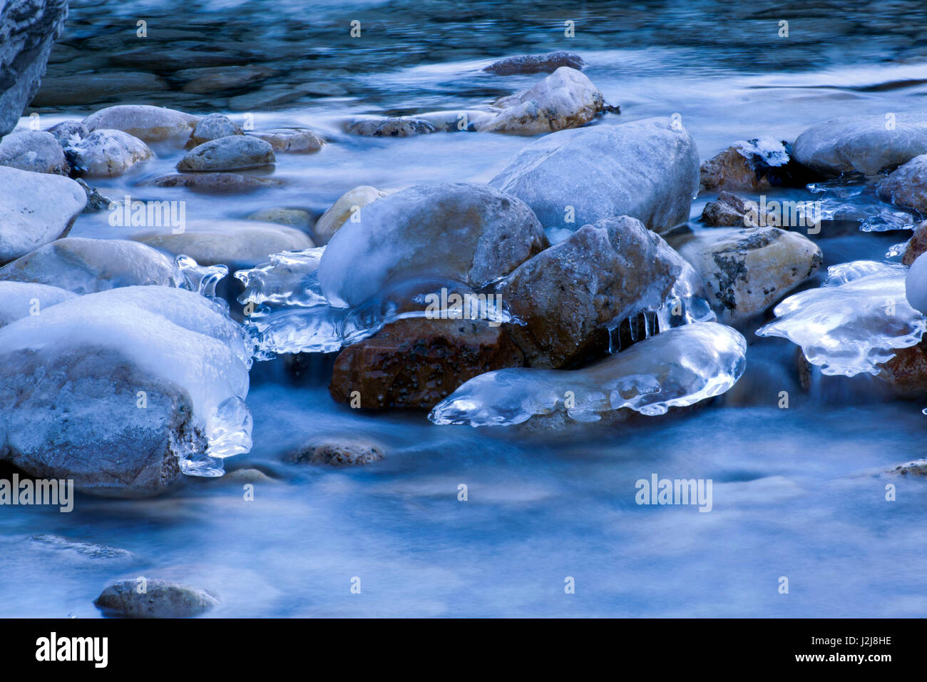 natural sculptural ice forms in the mountain brook Stock Photo - Alamy