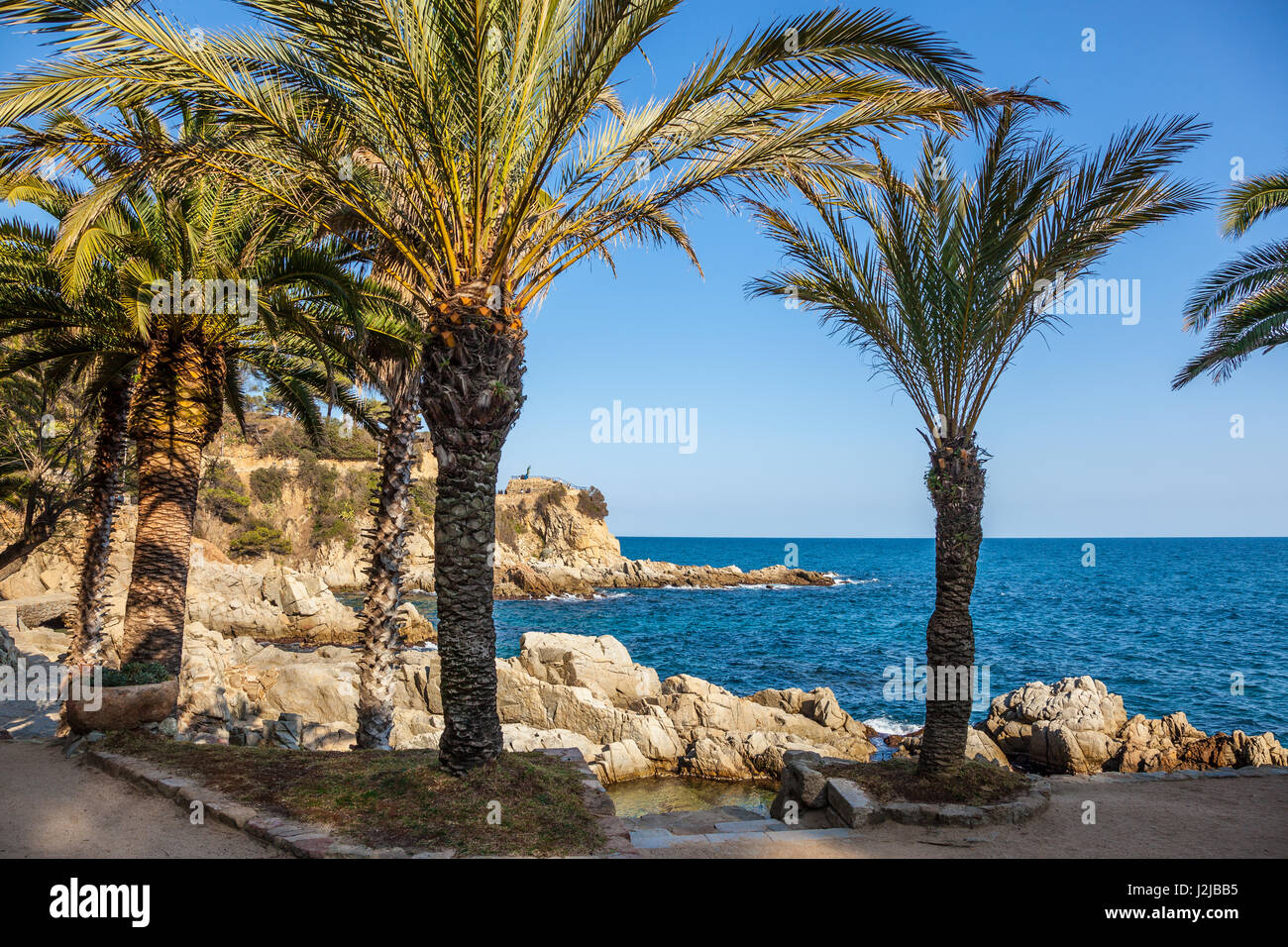 Idyllic Cala Banys at Lloret de Mar, Costa Brava can be reached by a ...