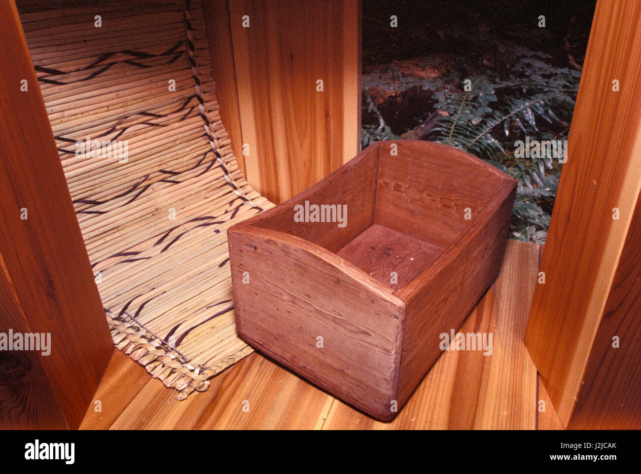 Chinook cedar wood storage box and woven reed Tule mat Stock Photo - Alamy