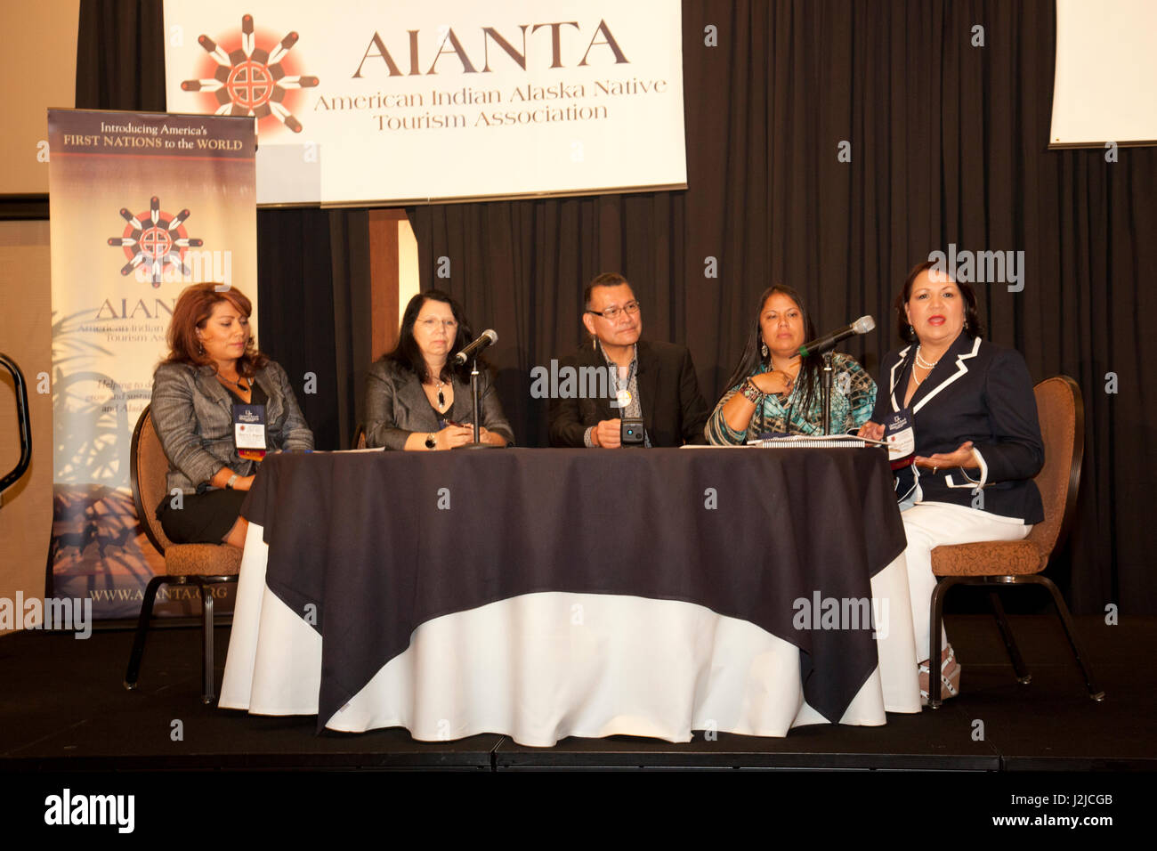 Panel discussion and keynote address during a round table discussion by ...