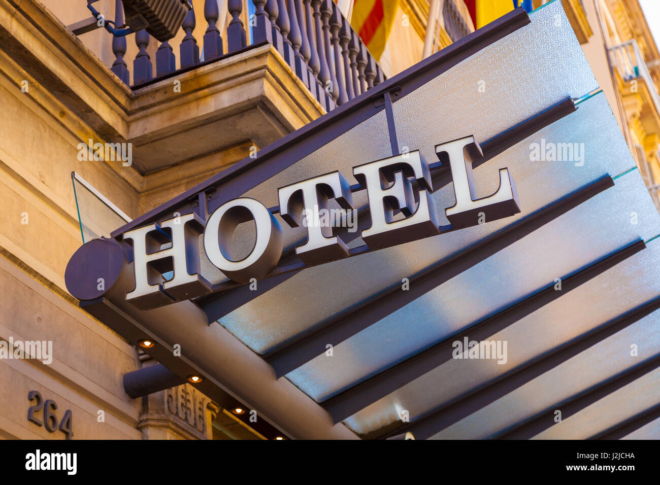 A hotel sign at the entrance of the building Stock Photo - Alamy