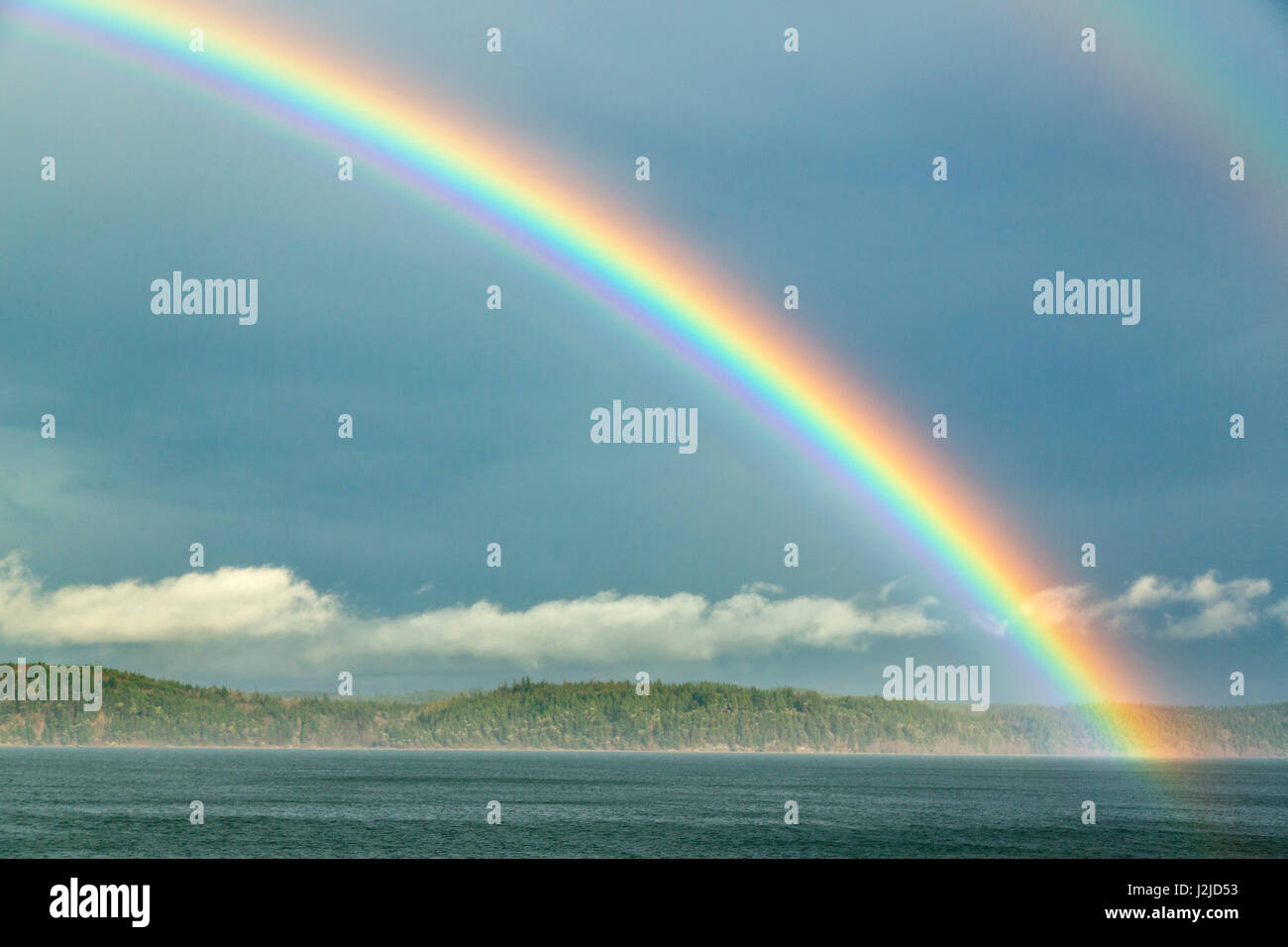 USA, Washington State, Seabeck. Rainbow over Hood Canal. Credit as: Don ...