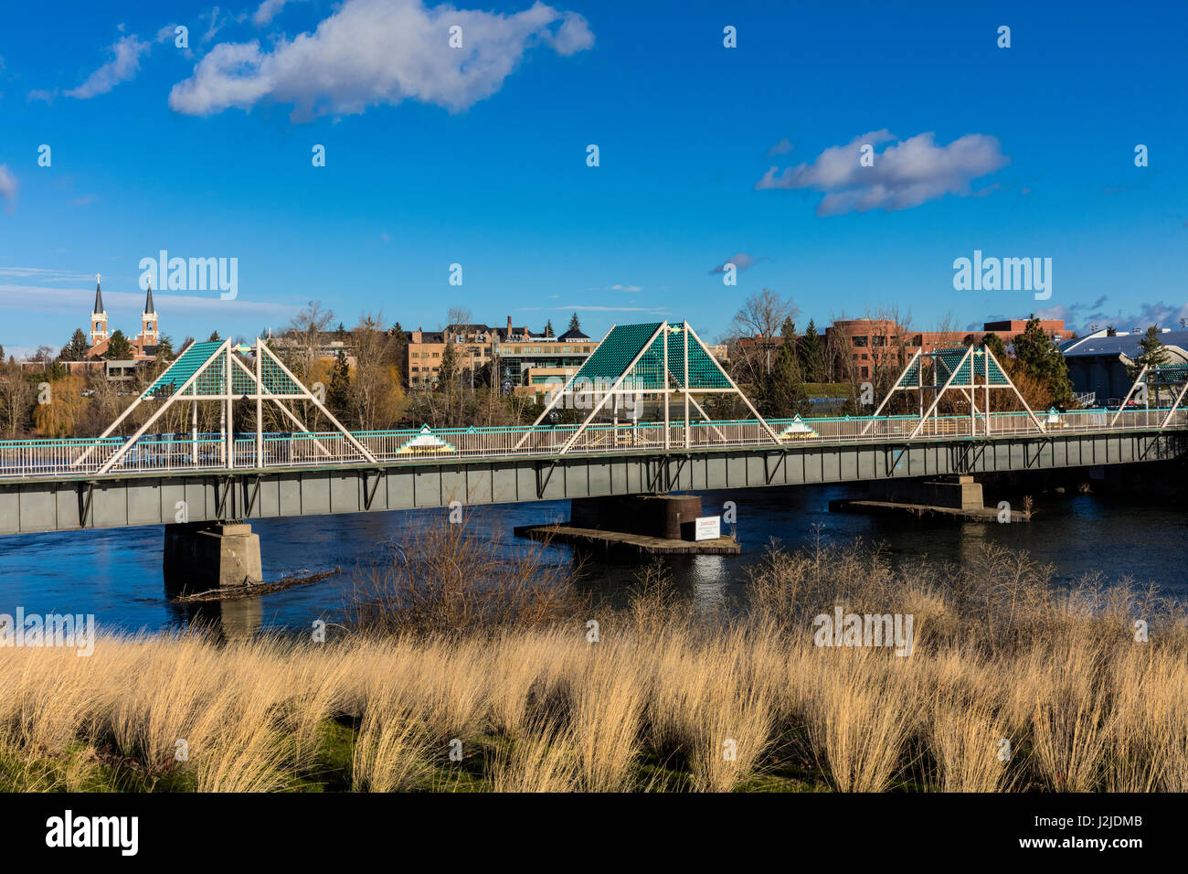 The Burlington Northern walking bridge crosses the Spokane River on the ...