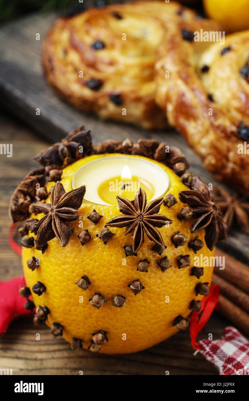 Pomander ball and swedish buns in the background. Festive decor Stock ...