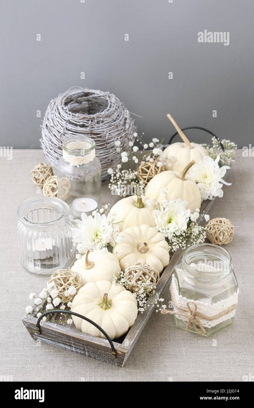 Floral decoration with white pumpkins called baby boo and chrysanthemum ...
