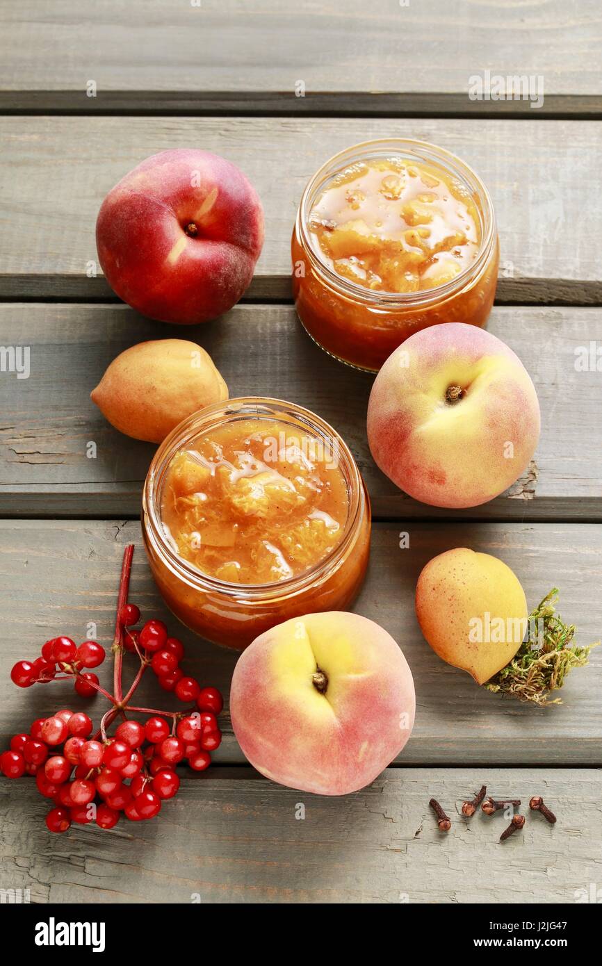 Peach jam and fruits. Healthy food Stock Photo - Alamy