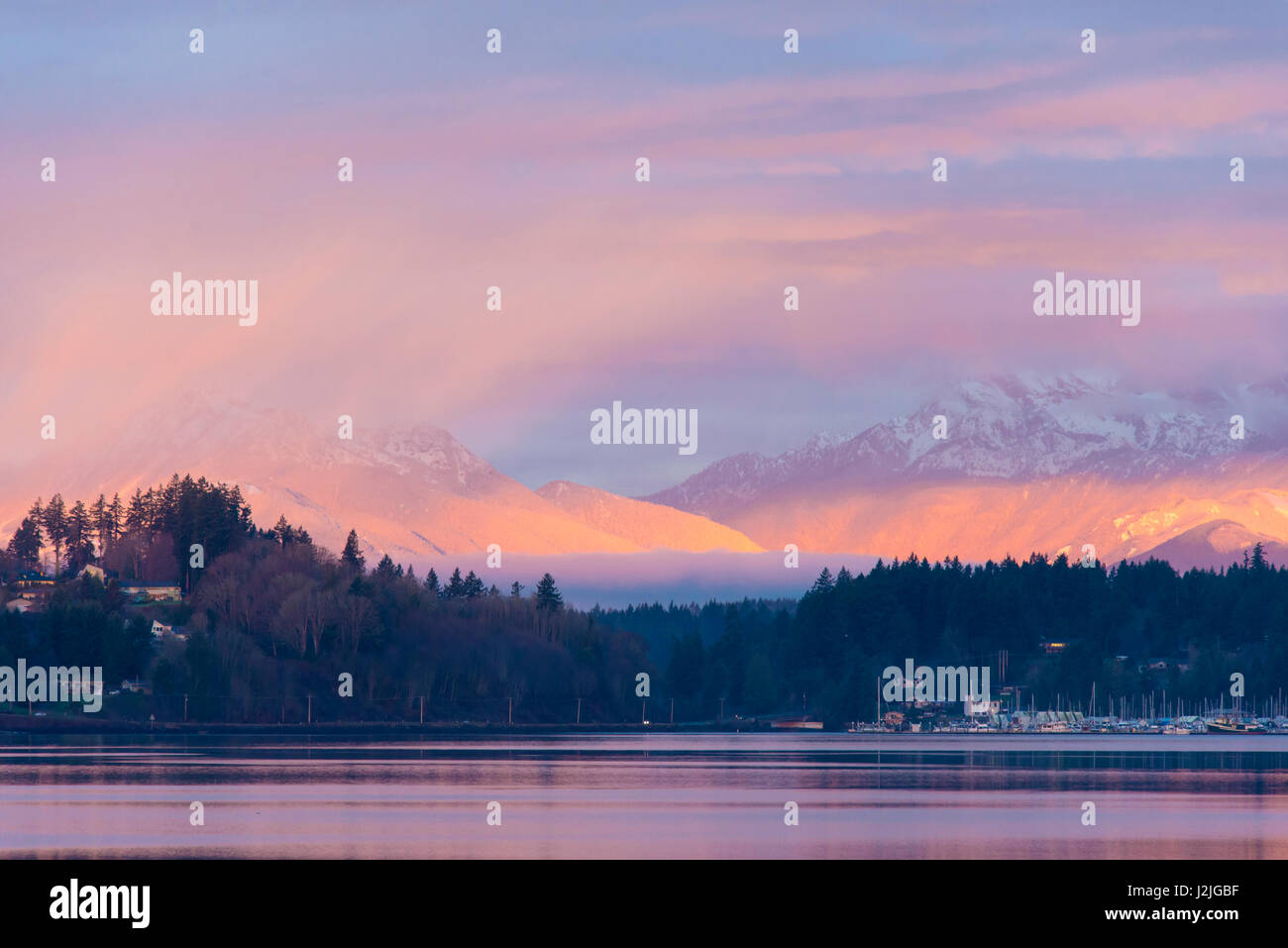 US, Washington State, Kitsap Peninsula. Dramatic pink sunrise patterns ...
