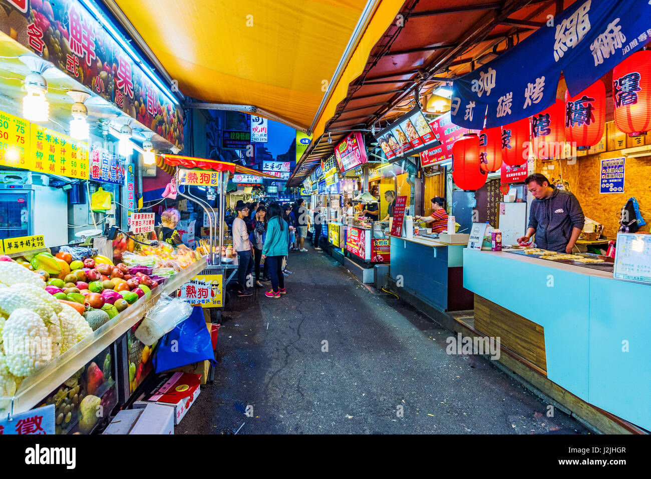 TAIPEI, TAIWAN - MARCH 30: This is a small market street with street ...