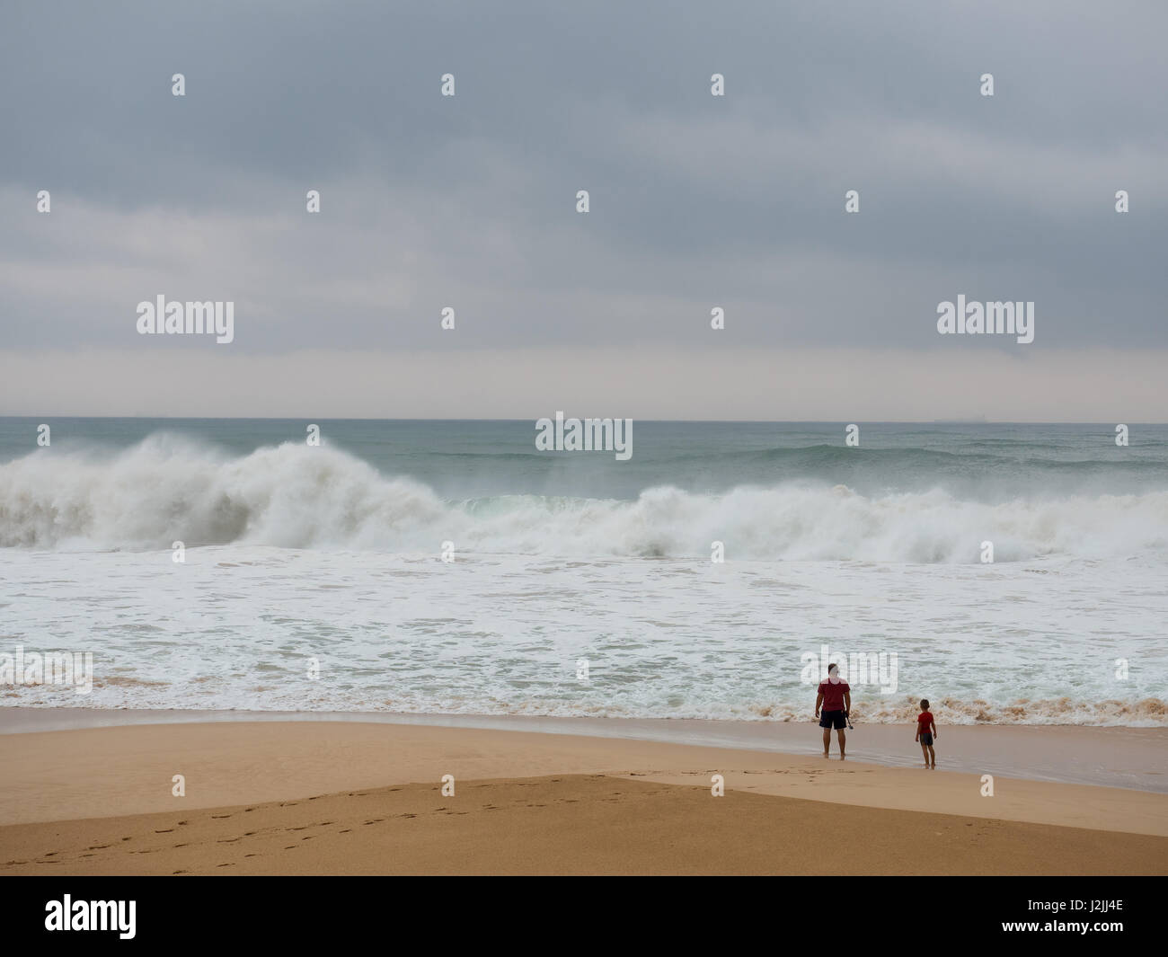 The storm. Rainy tropical island and people on the beach Stock Photo ...