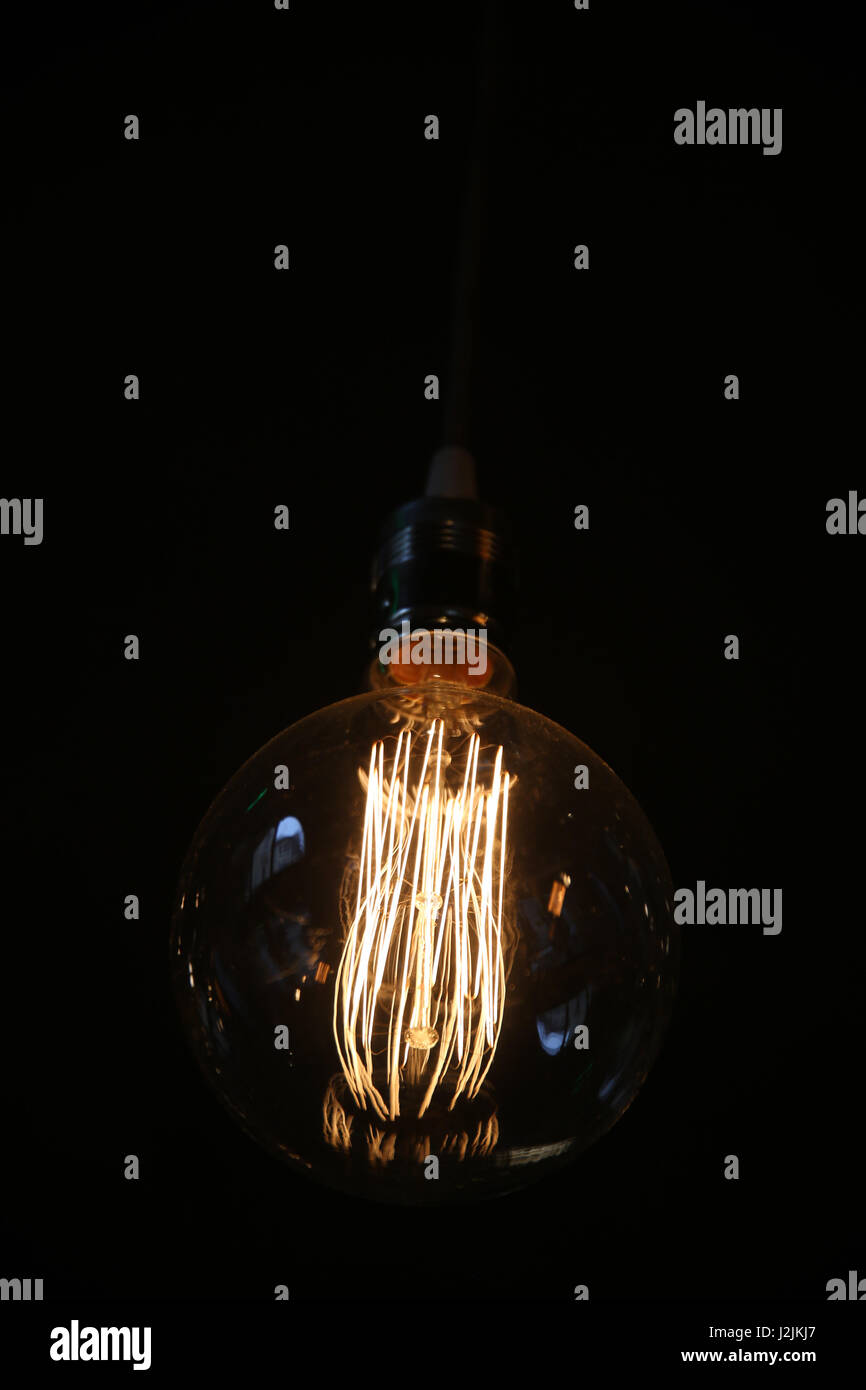 Classic light bulb shining bright hi-res stock photography and images ...