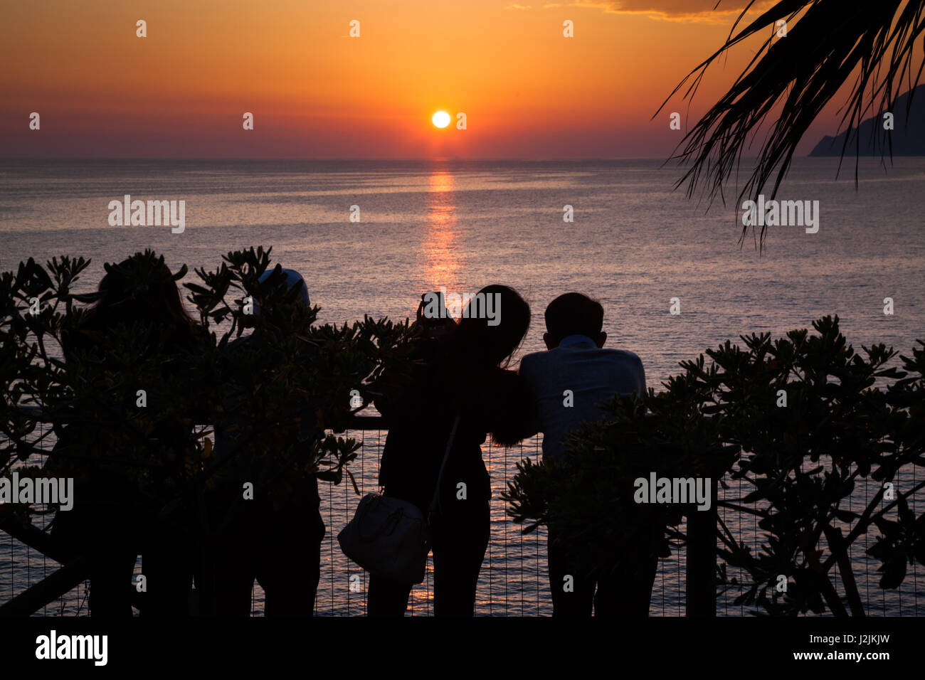 Watching beautiful sunset hi-res stock photography and images - Alamy