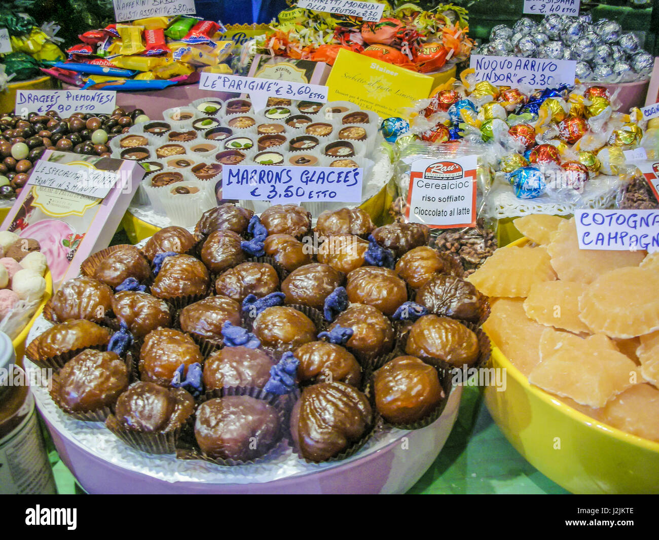 Colourful sweets on display in a shop window in Treviso, Veneto, Ital ...