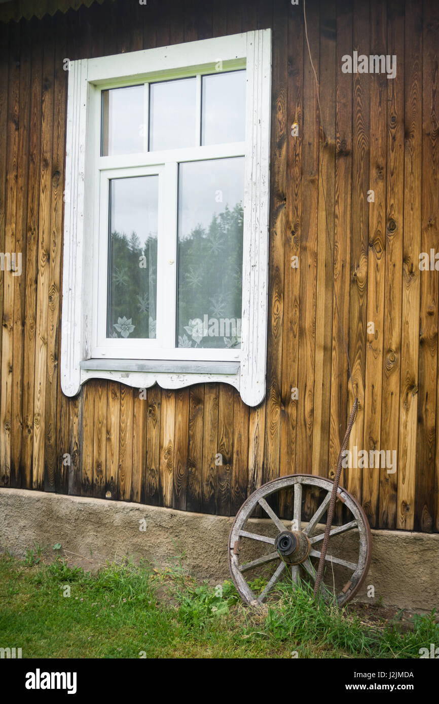 Aged retro window of the old wooden house on the private farm Stock ...