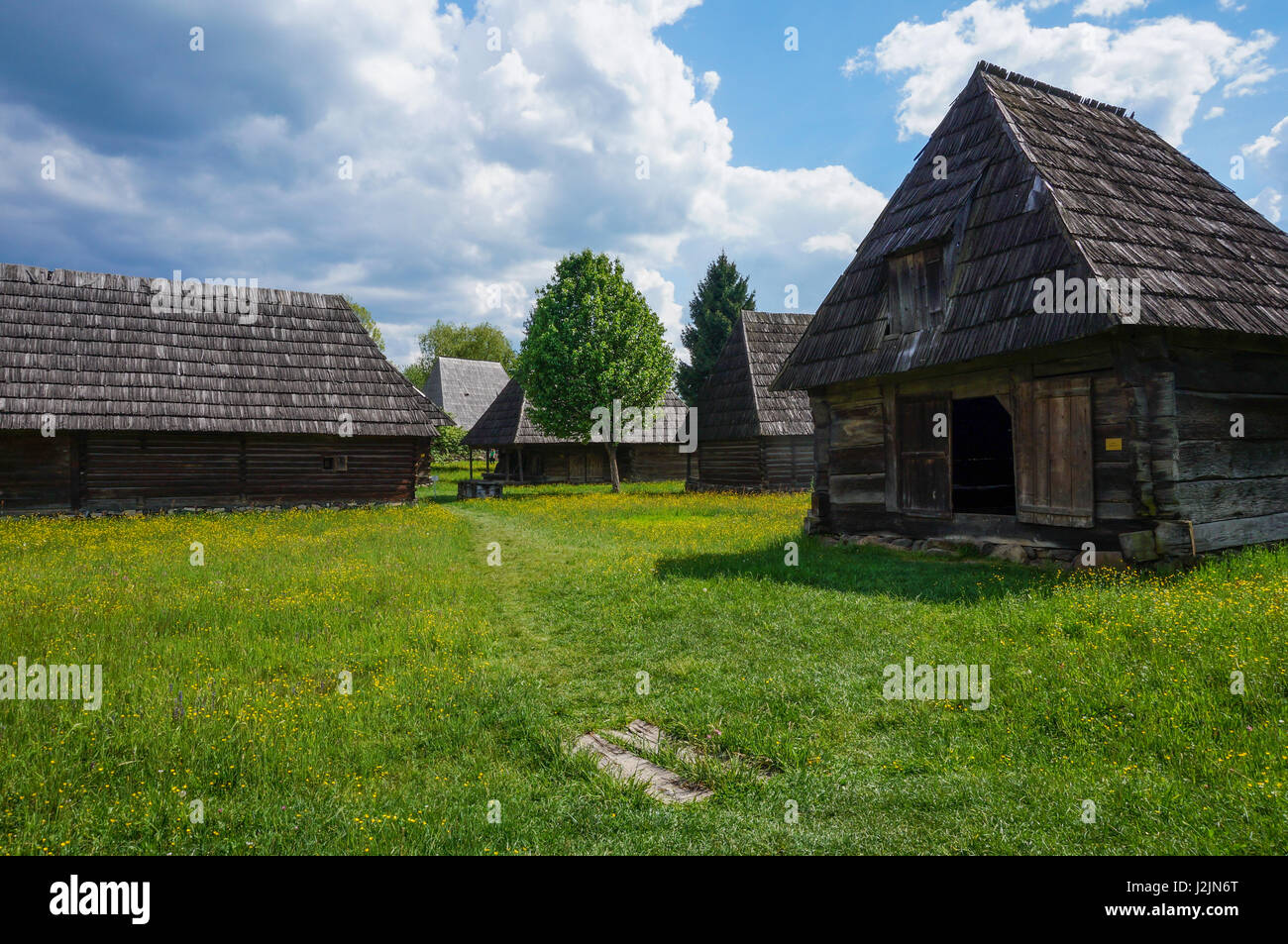 Typical traditional romanian houses and barns on display at the village ...