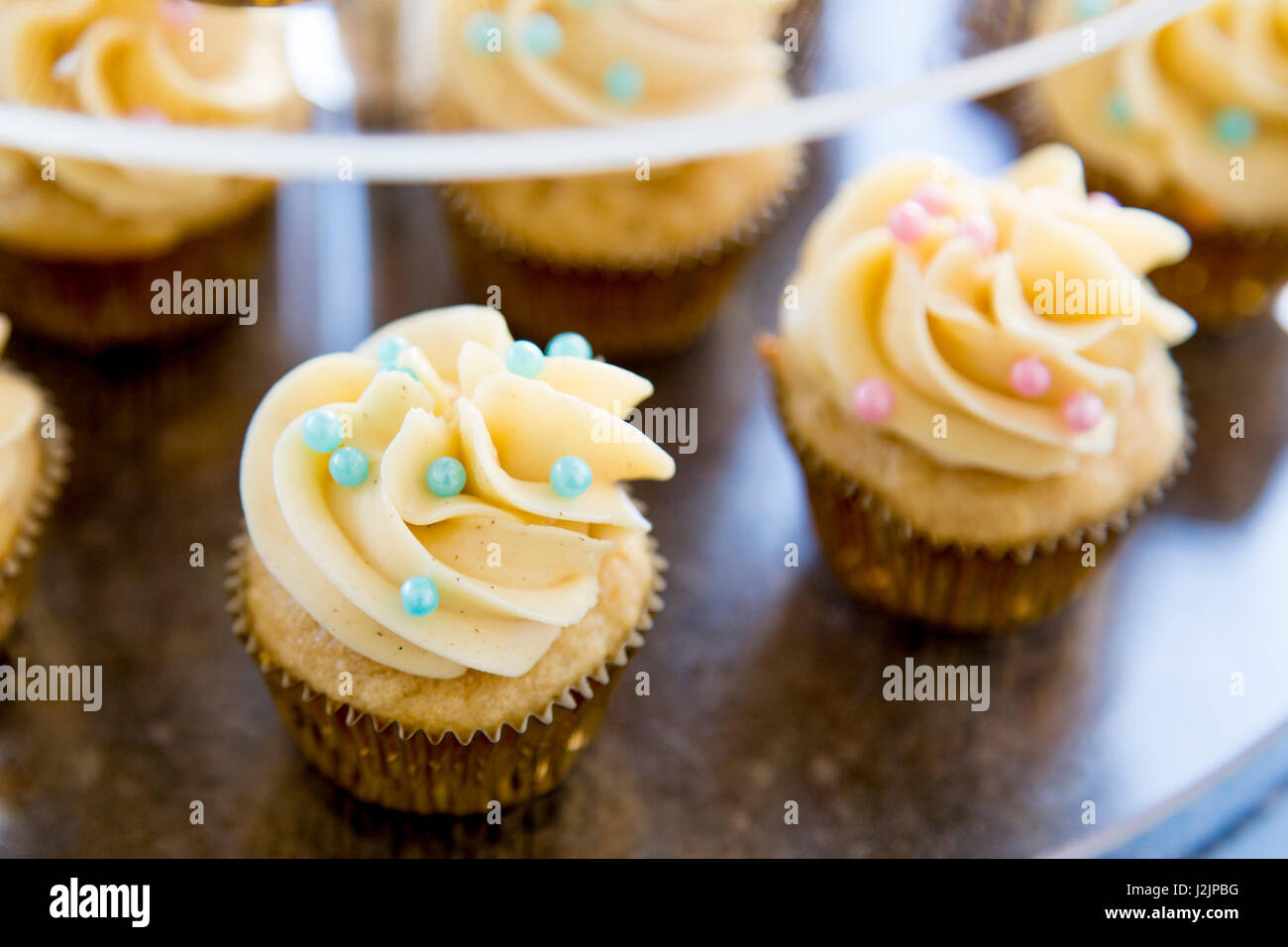 Tiered buttercream cake hi-res stock photography and images - Alamy