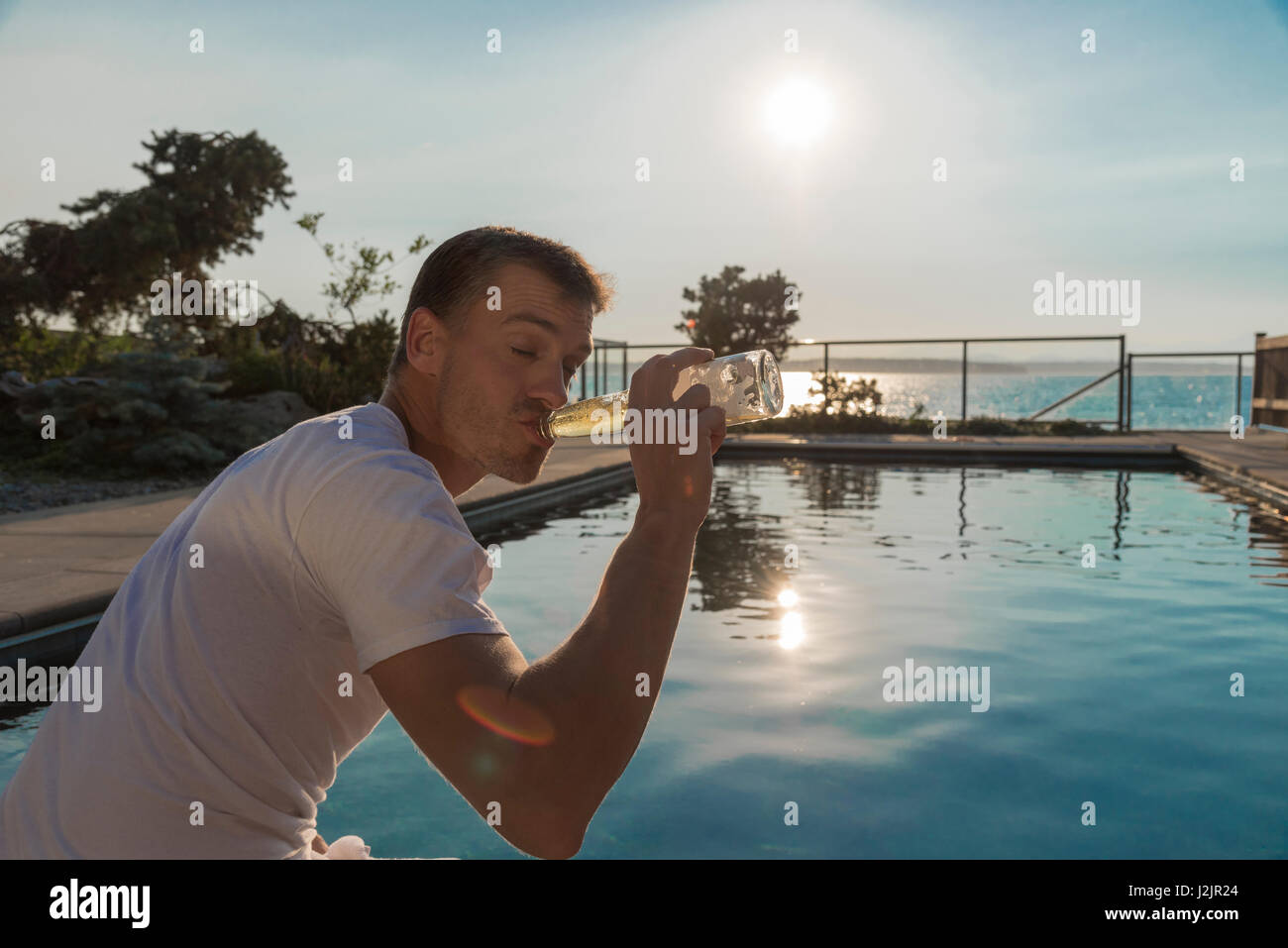 Swigging hi-res stock photography and images - Alamy