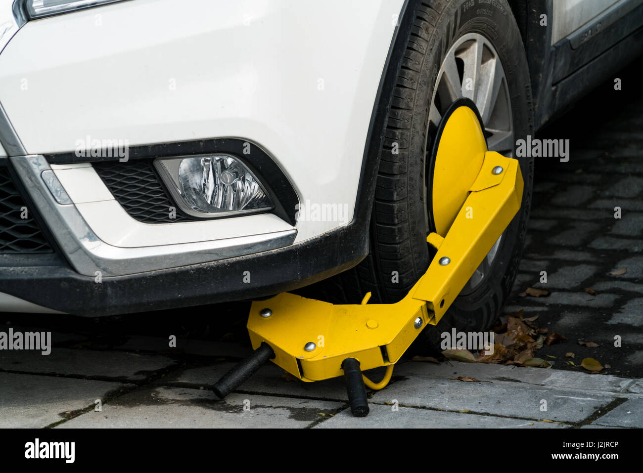 Parking clamp on tyre hi-res stock photography and images - Alamy