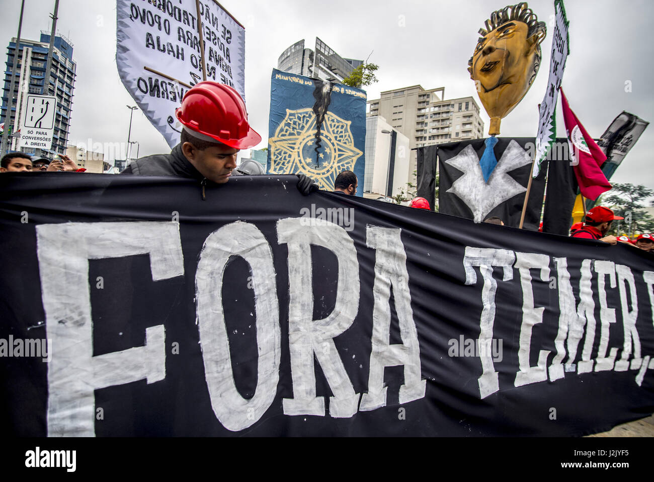 Sao Paulo, Brazil. 28th April, 2017. Demonstrators take part in a ...