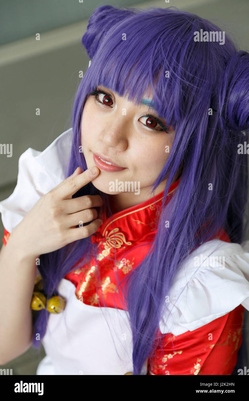 Chiba, Japan. 29th April, 2017. A cosplayer poses for a photograph ...