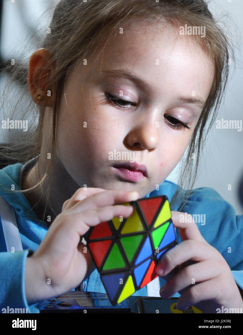 Girl With Rubiks Cube High Resolution Stock Photography and Images - Alamy