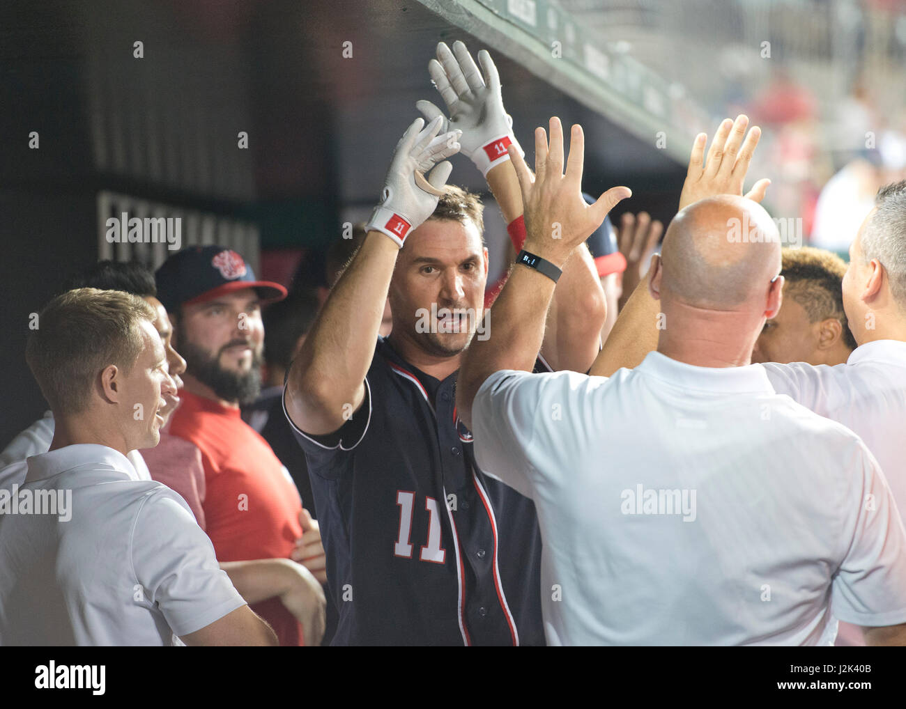 Washington Nationals first baseman Ryan Zimmerman (11) celebrates his ...