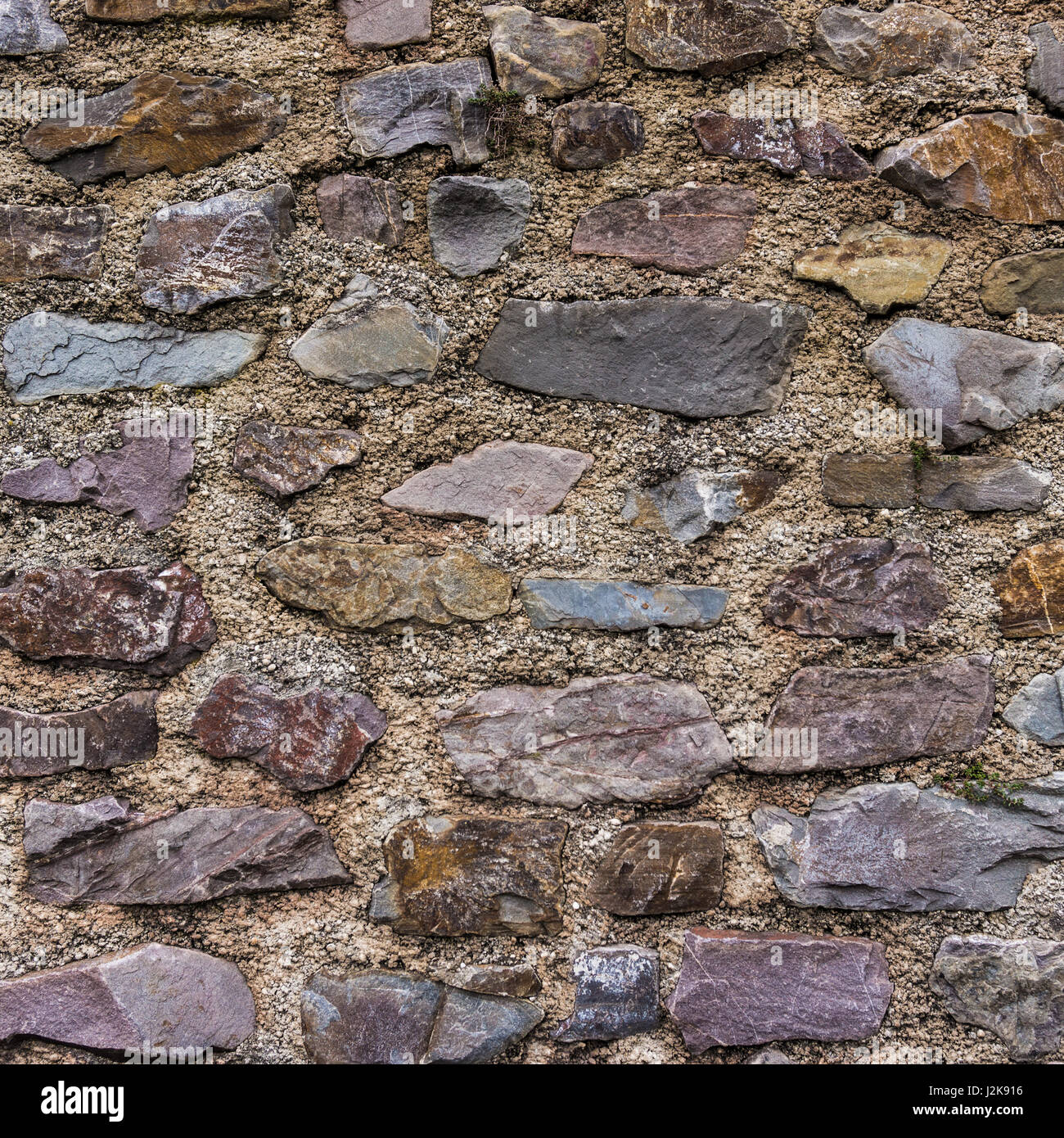 old stone wall. pattern of decorative slate stone wall surface ...